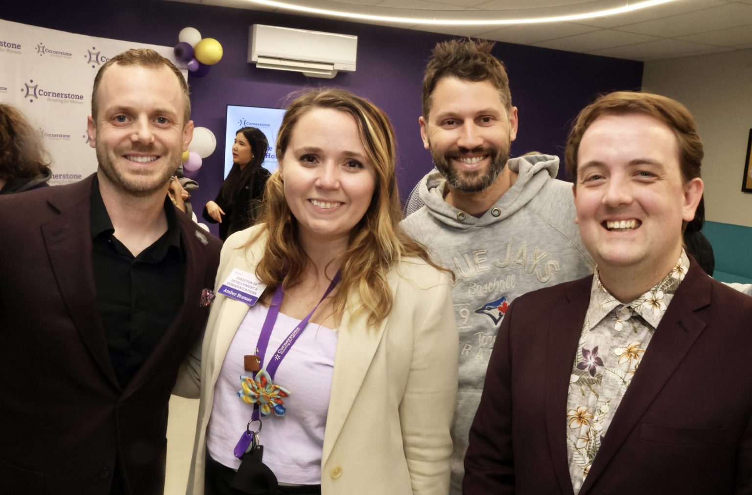 Cornerstone Housing for Women snips the ribbon for opening of 44 Eccles