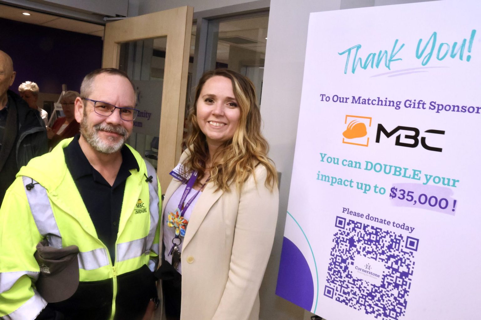 Cornerstone Housing for Women snips the ribbon for opening of 44 Eccles